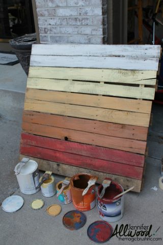 An Ombre painted pallet for fall decorations on your front porch